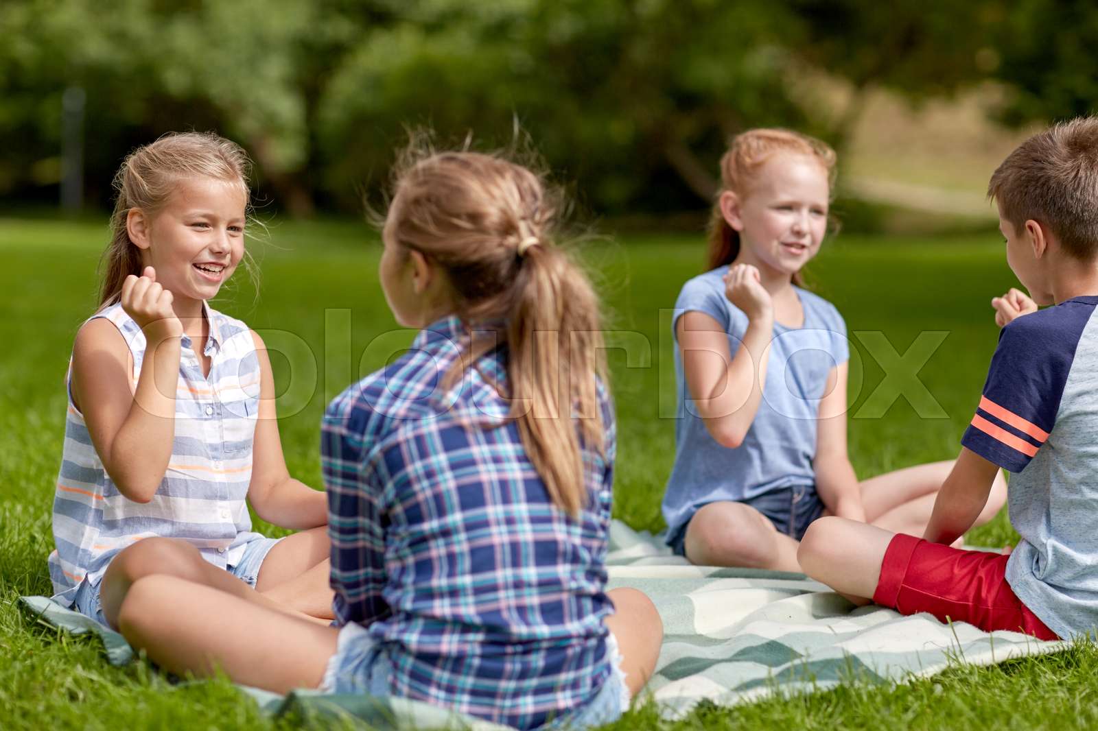 happy kids playing rock-paper-scissors game | Stock image | Colourbox