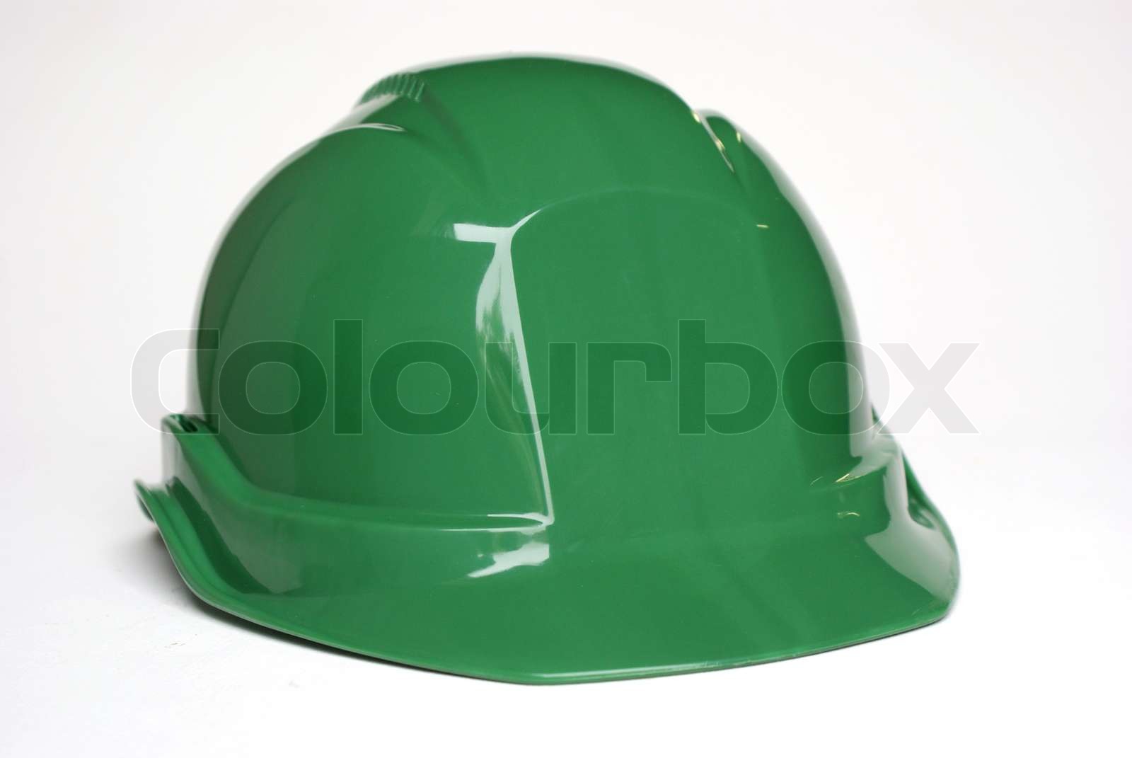 Safety helmet. Green. | Stock image | Colourbox