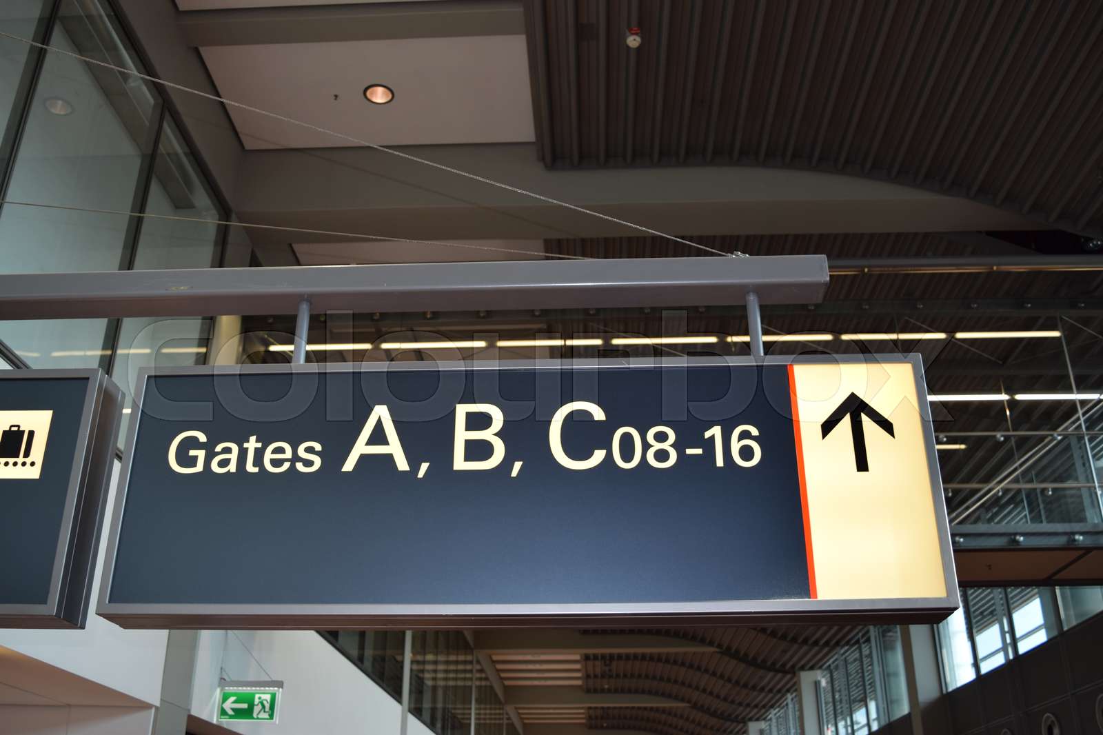 Airport gates sign showing direction to gates | Stock image | Colourbox