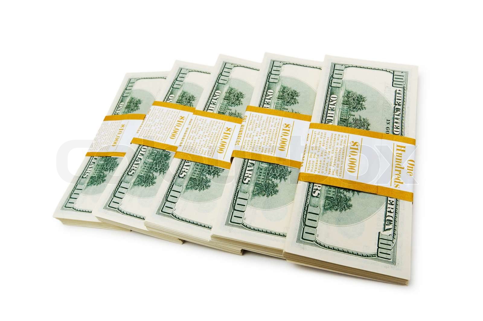 Ti tusind dollar stakke på den hvide | Stock foto | Colourbox