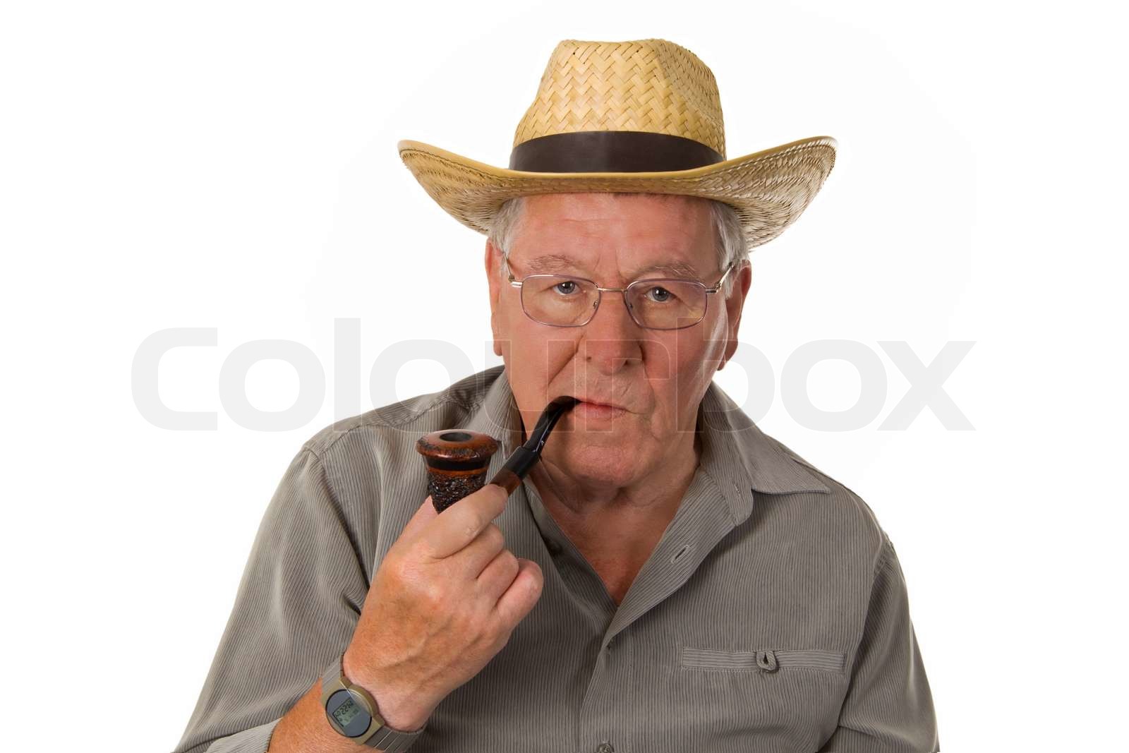 Old man with hat smoking a pipe - isolated | Stock image | Colourbox