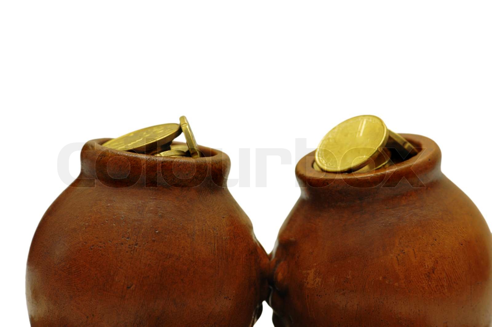 Two clay pots with golden coins isolated on white | Stock image | Colourbox