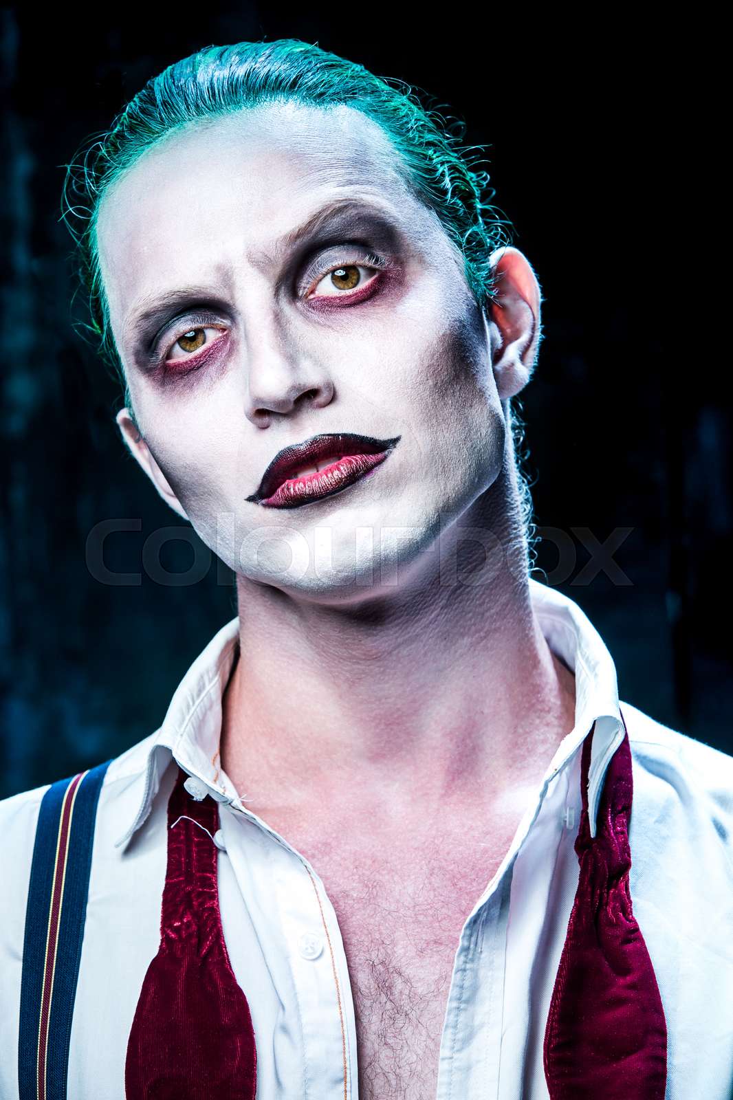 Bloody Halloween theme: crazy joker face | Stock image | Colourbox