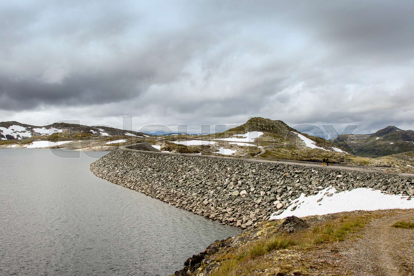 Tall dam in Norway made of huge heap of stones | Stock image | Colourbox