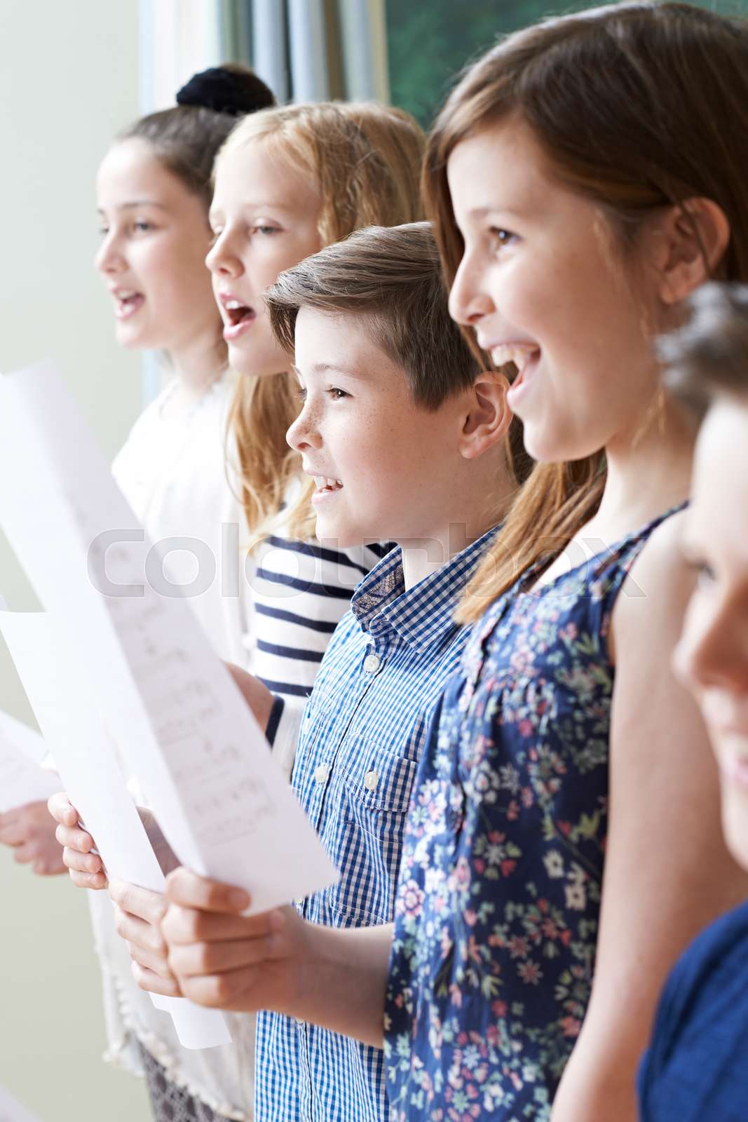Group Of Children Enjoying Singing Group | Stock image | Colourbox