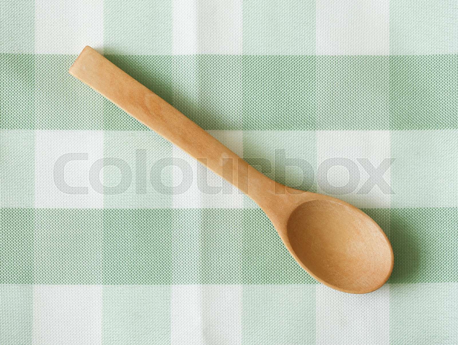 Wooden Spoon On Cloth | Stock image | Colourbox