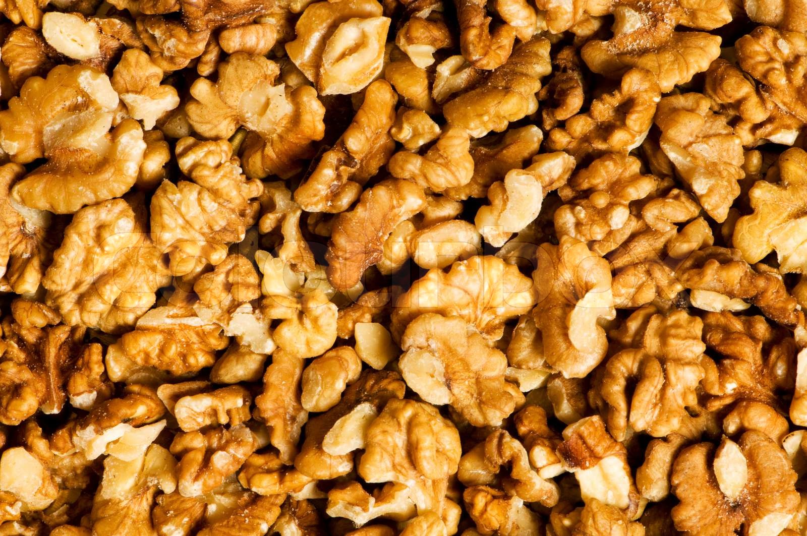 Background made of fresh walnut nuts | Stock image | Colourbox