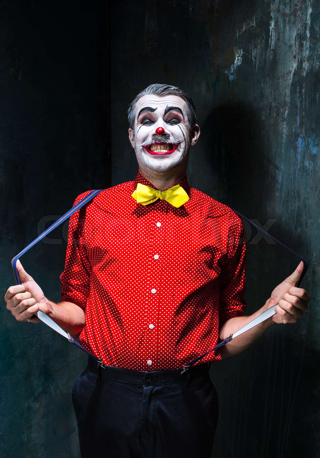 Terrible clown and Halloween theme: Crazy red clown in a shirt with ...