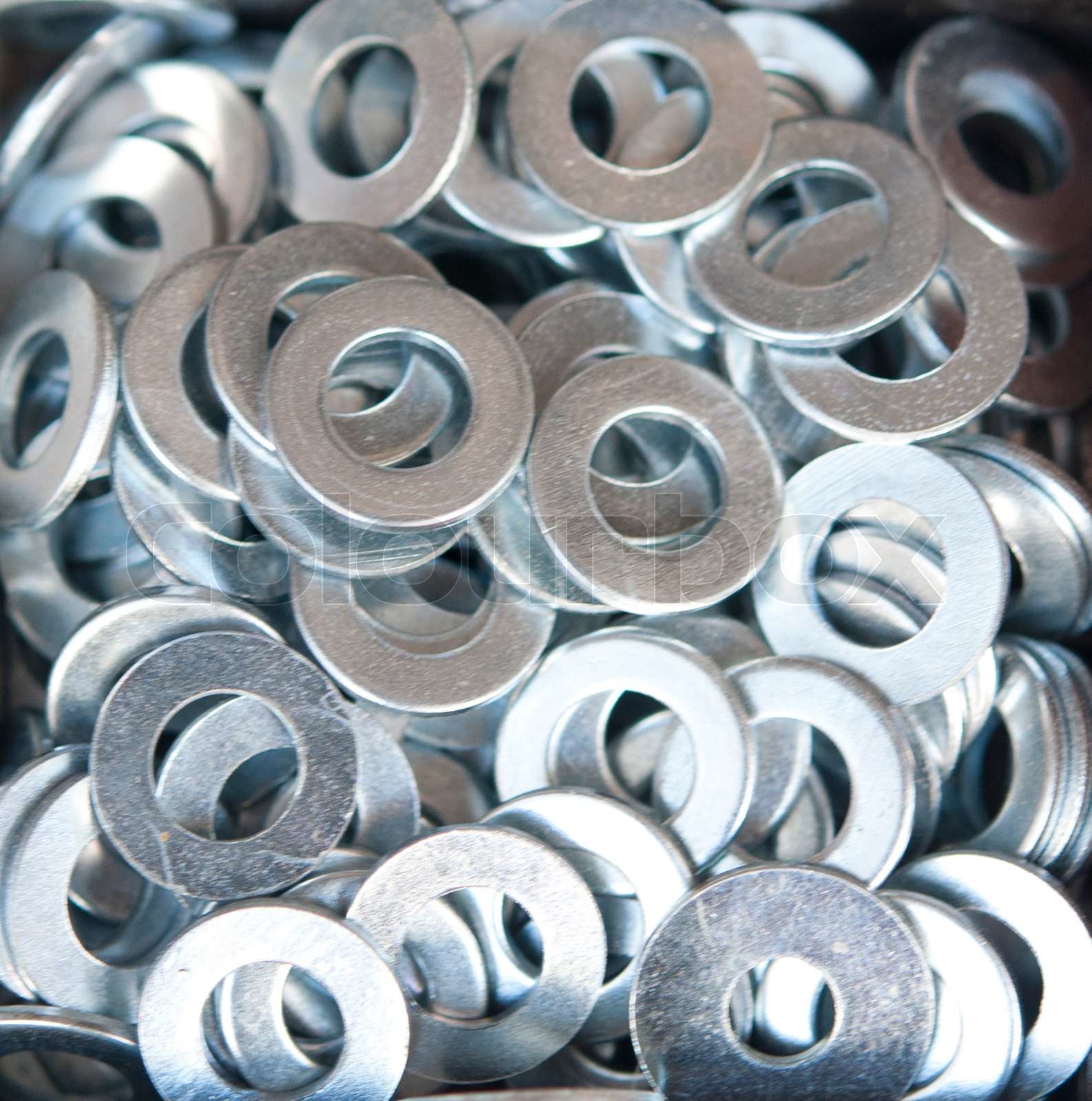 washers in a drawer of hardware. | Stock image | Colourbox