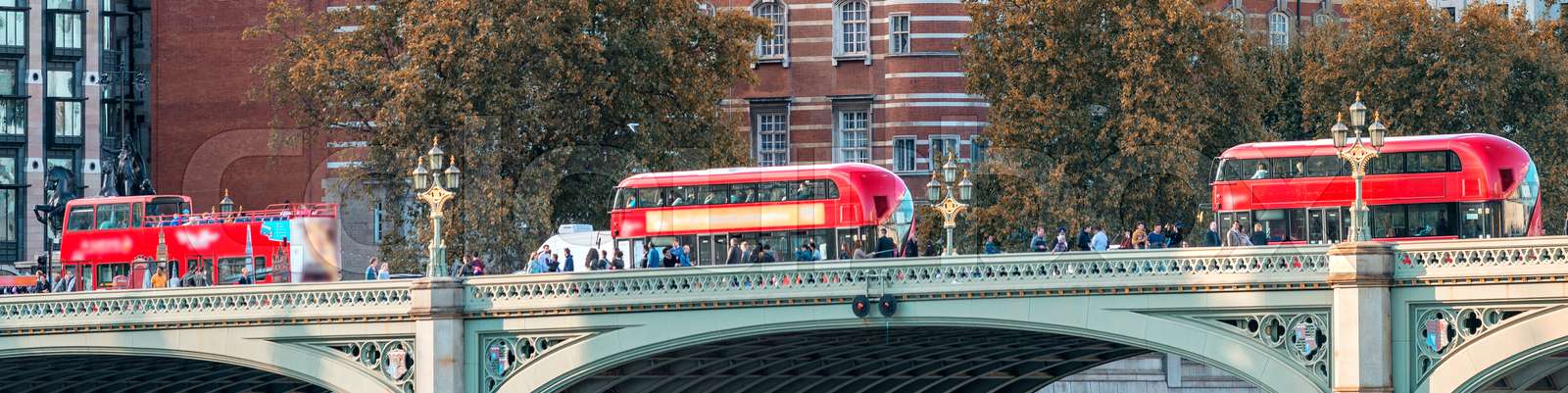 Three red buses crossing Westminster Bridge, London - UK | Stock image ...