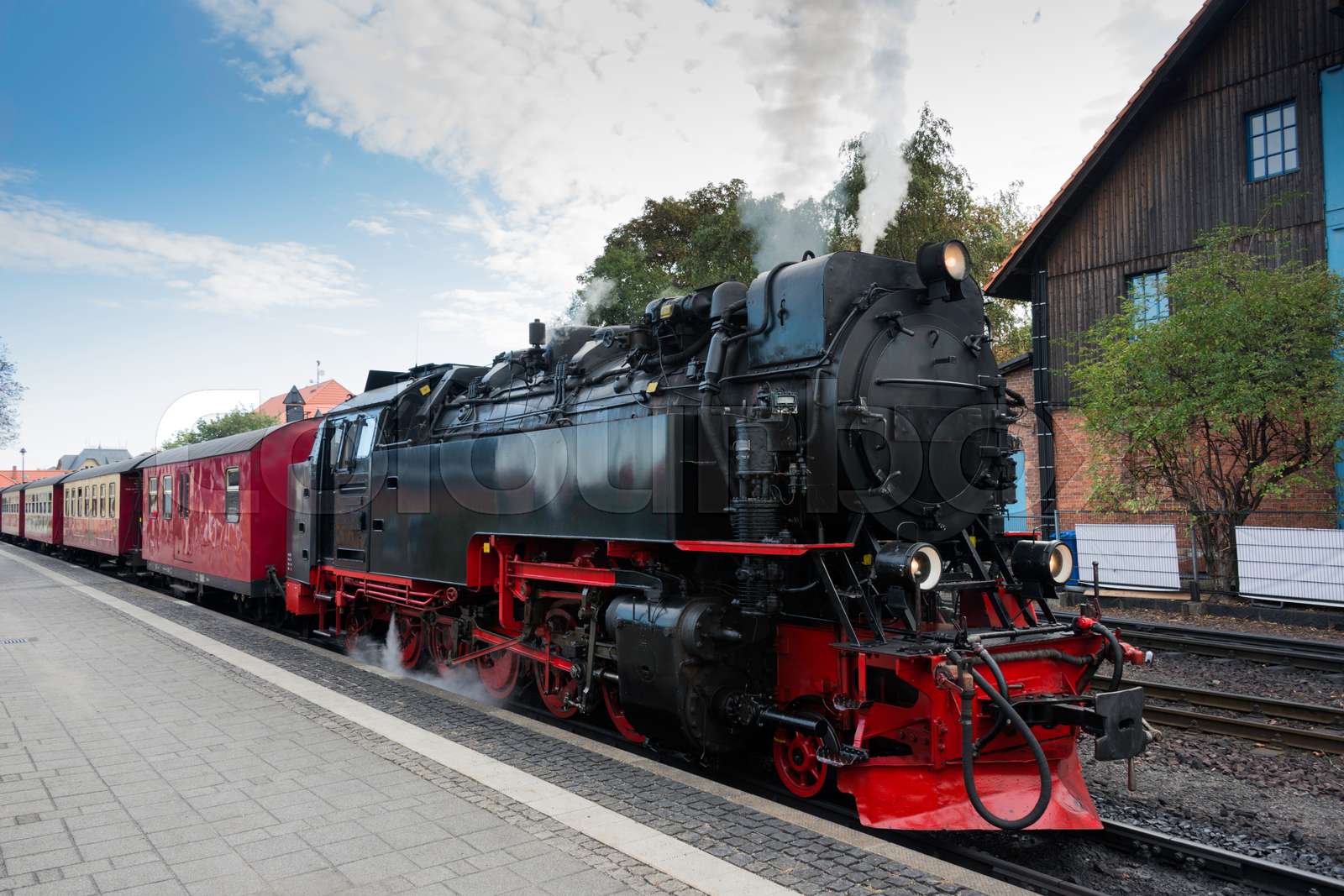 old steam train in germany | Stock image | Colourbox