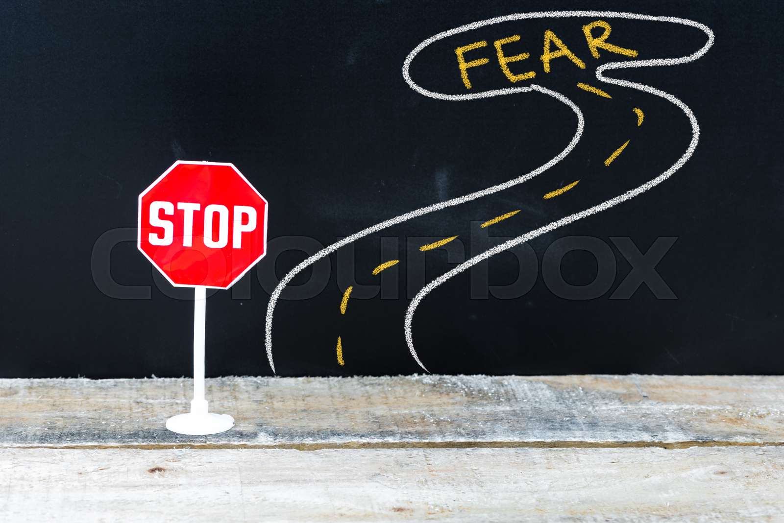 Mini STOP sign on the road to FEAR | Stock image | Colourbox