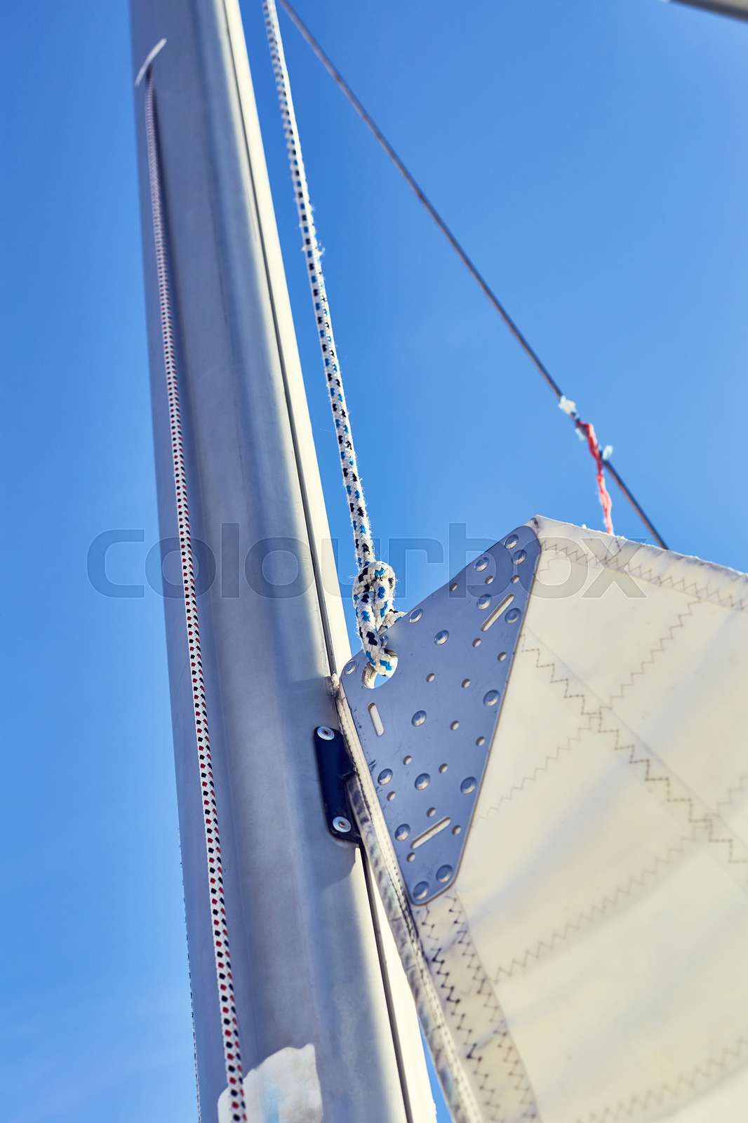 Mast track sail and its functions, front luff | Stock image | Colourbox