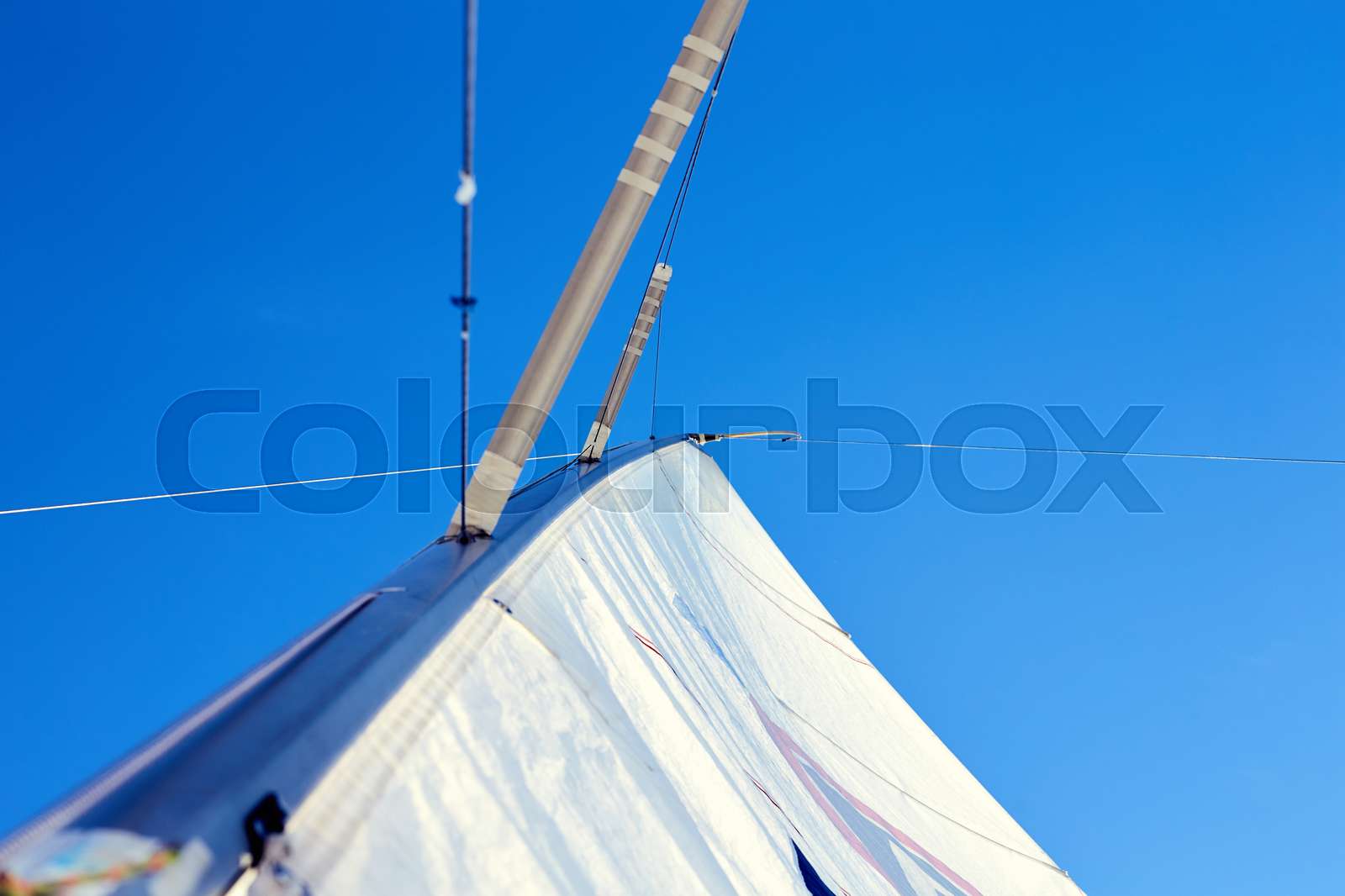 permanent backstay is attached to the top of the mast. | Stock image ...