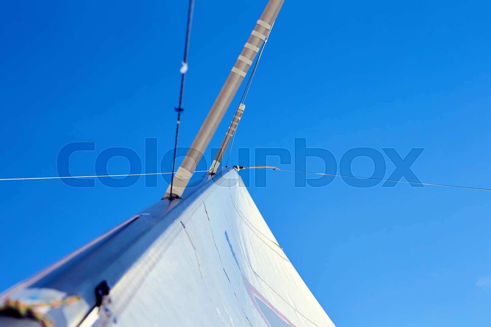 permanent backstay is attached to the top of the mast. | Stock image ...