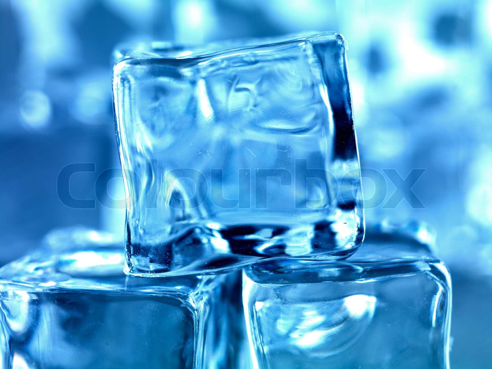 Frozen ice cubes isolated on a kitchen bench | Stock image | Colourbox