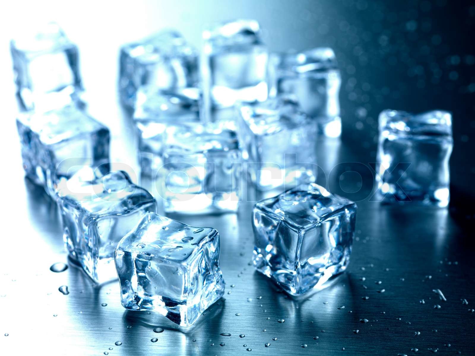 Frozen ice cubes isolated on a kitchen bench | Stock image | Colourbox