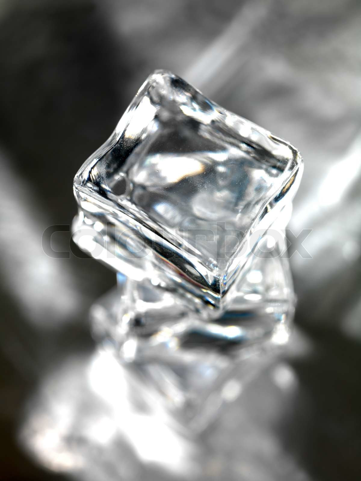 Frozen ice cubes isolated on a kitchen bench | Stock image | Colourbox