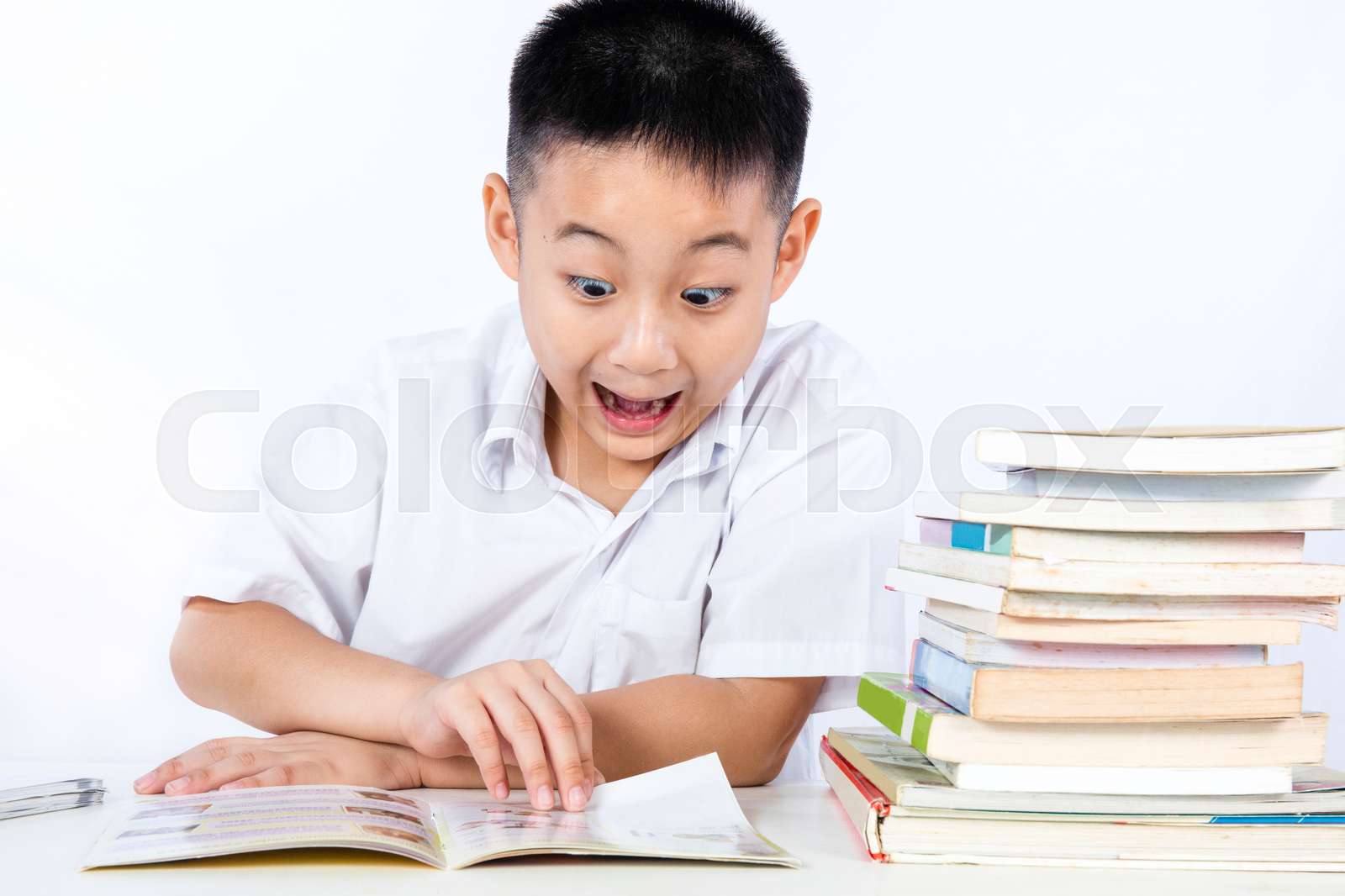 Surprise Asian Chinese Little Boy Wearing Student Uniform Reading ...