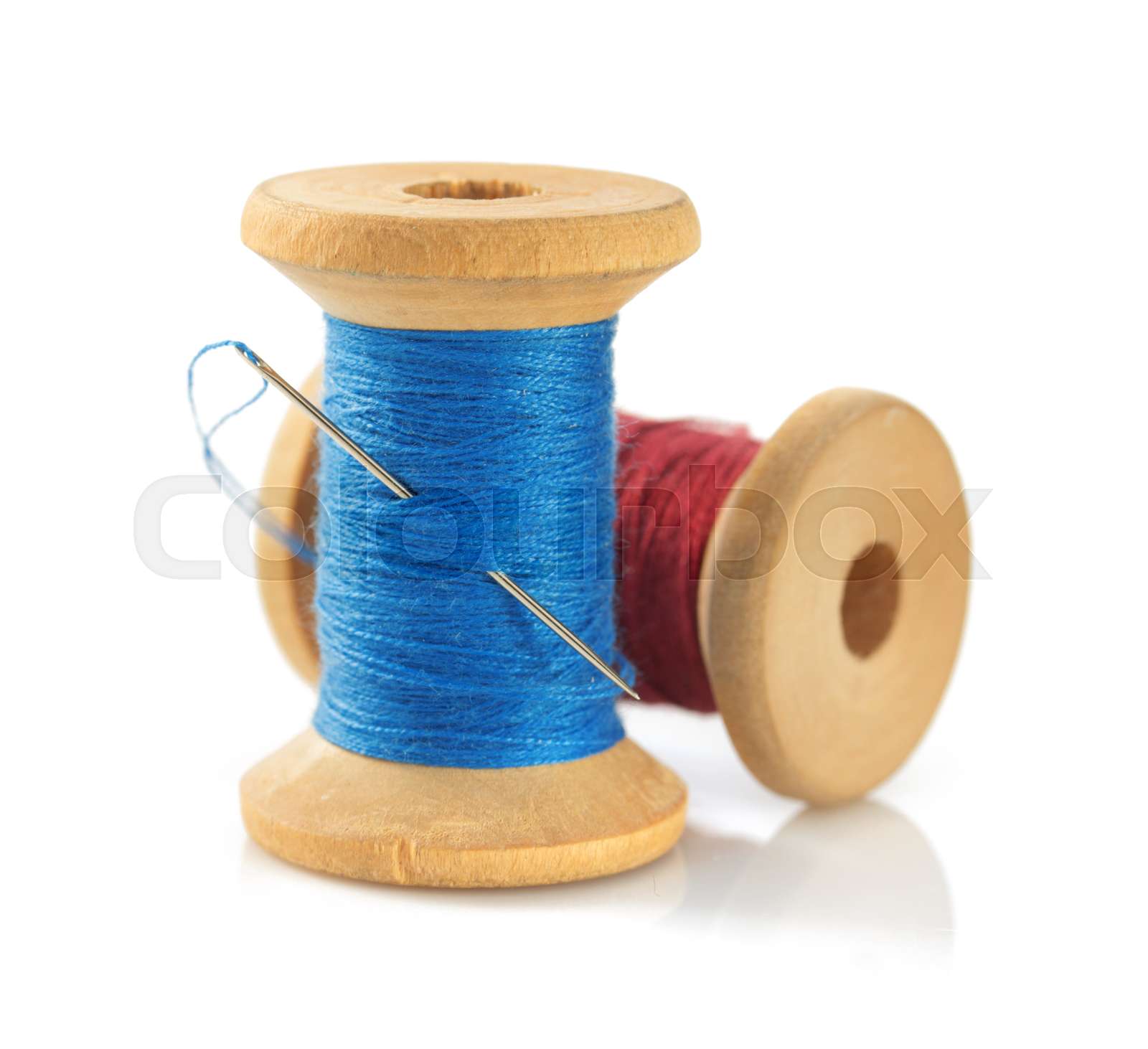 spool of thread isolated on white | Stock image | Colourbox