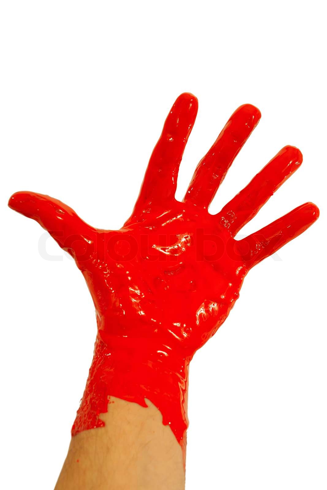 A hand is covered with red paint. | Stock image | Colourbox