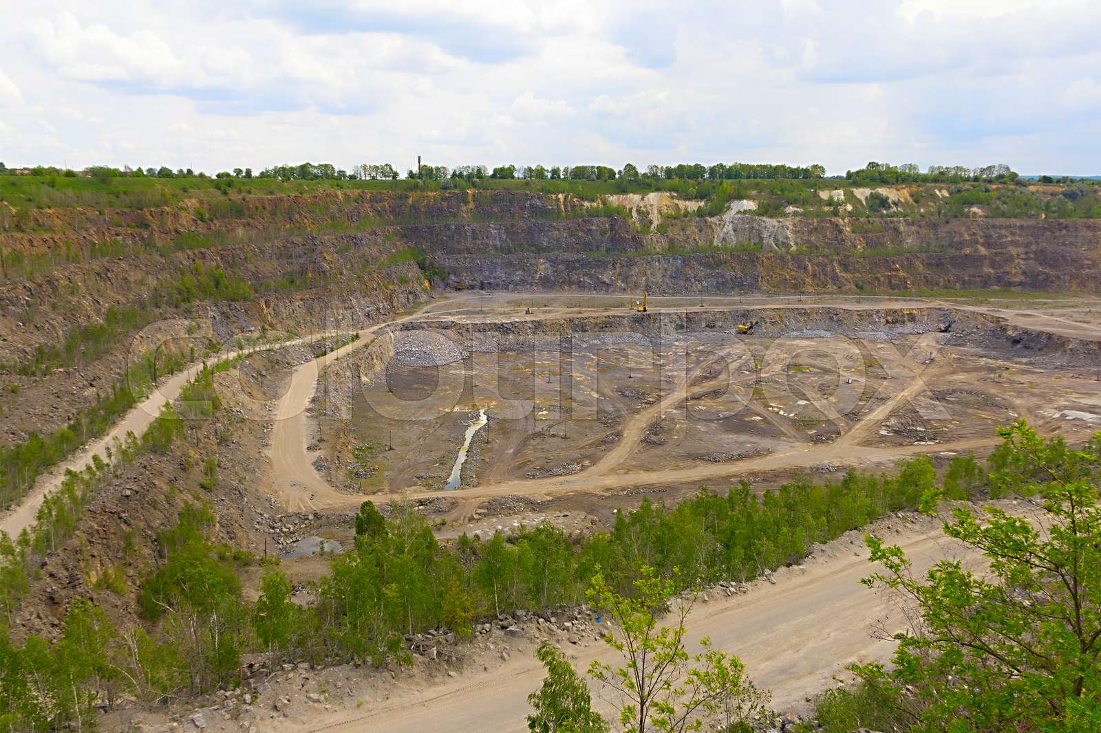 granite stone extraction in the quarry | Stock image | Colourbox