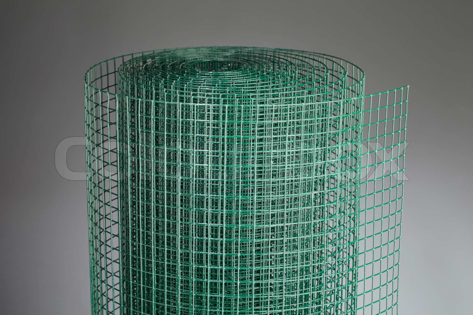 Coated green metallic wire mesh used in gardening by protecting plants ...