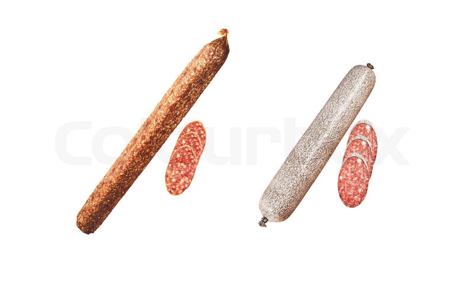 Two salami sticks with slices isolated on white | Stock image | Colourbox