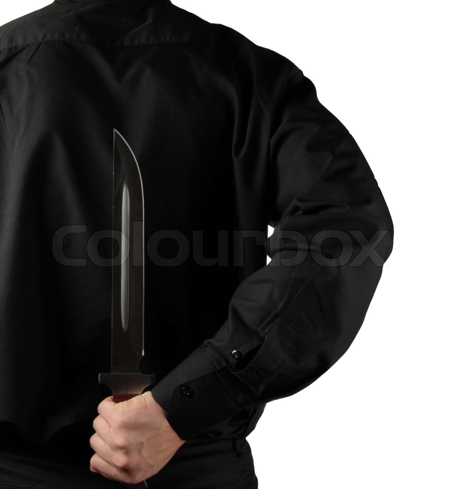 Holding Knife Behind His Back on white | Stock image | Colourbox