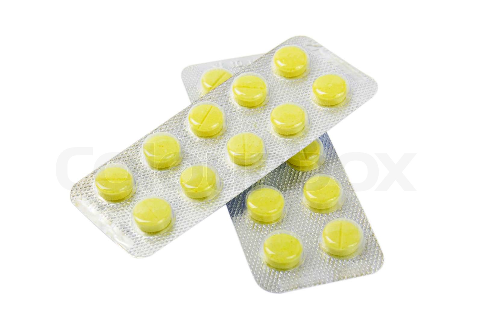 Package mit gelben Tabletten auf dem weißen | Stock Bild | Colourbox