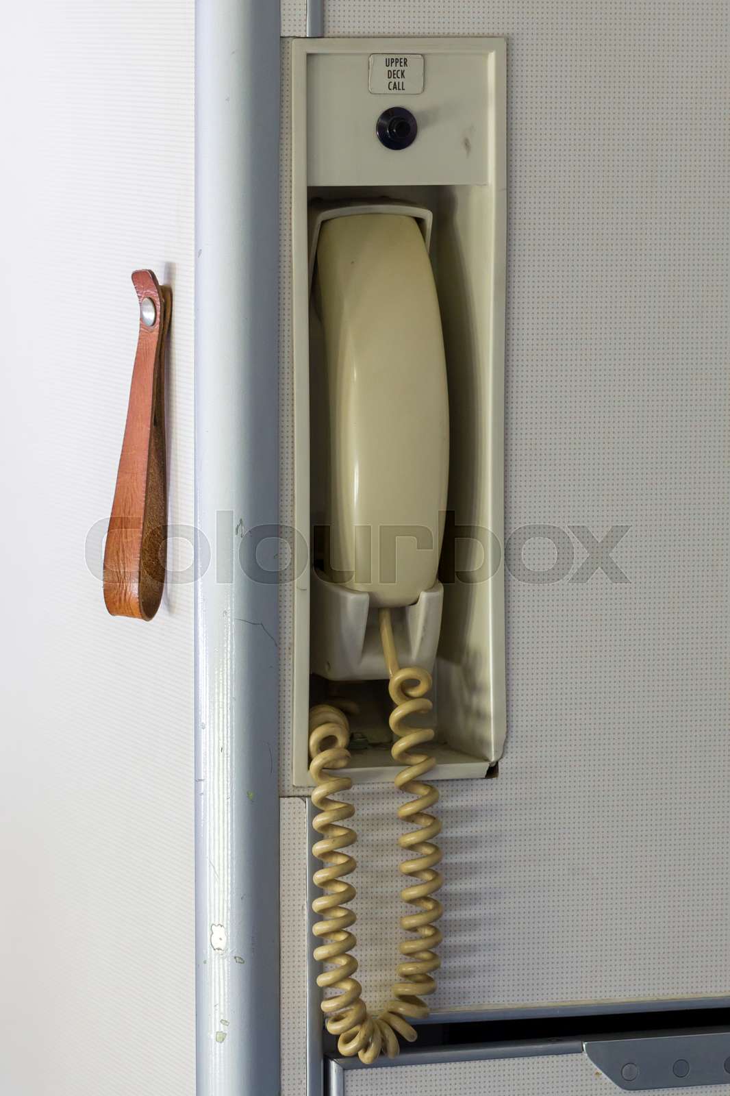 Vintage telephone in an airplane | Stock image | Colourbox