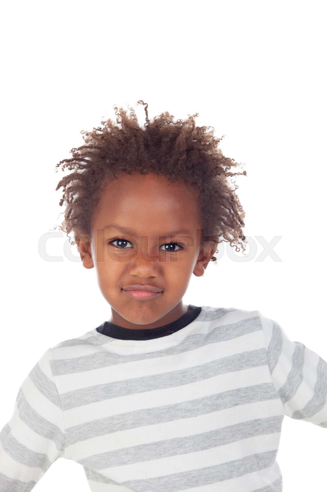 African child putting mean face | Stock image | Colourbox