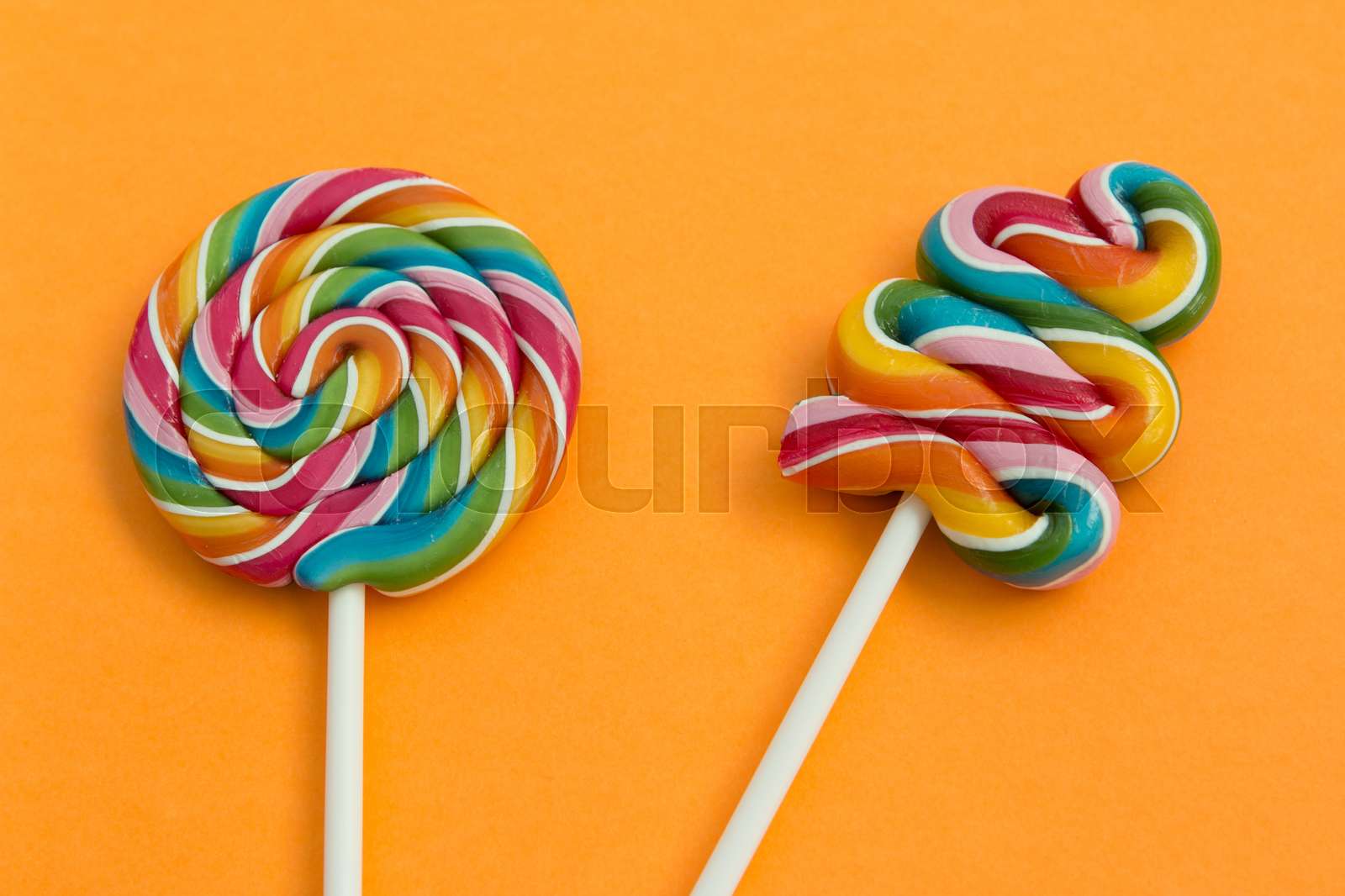 Two lollipops with many colors in a spiral | Stock image | Colourbox