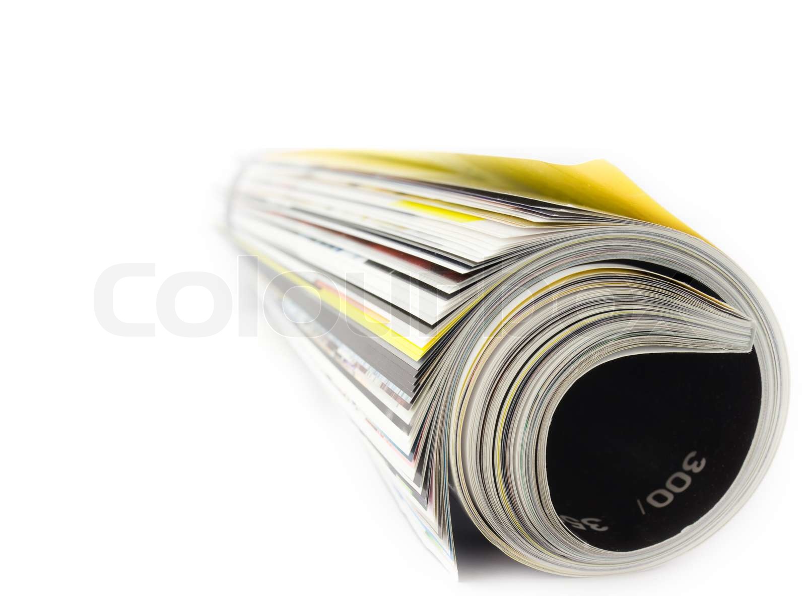 "Rolled magazine" | Stock image | Colourbox