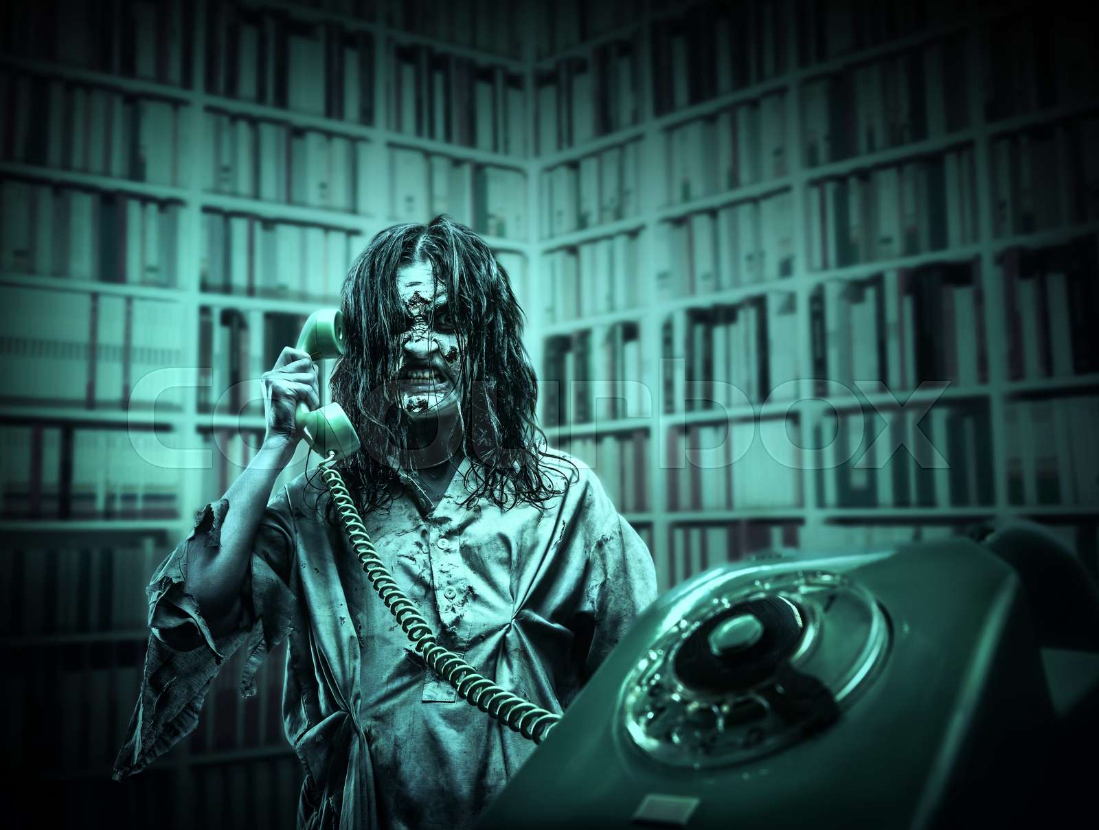 Horror zombie girl calling by phone | Stock image | Colourbox