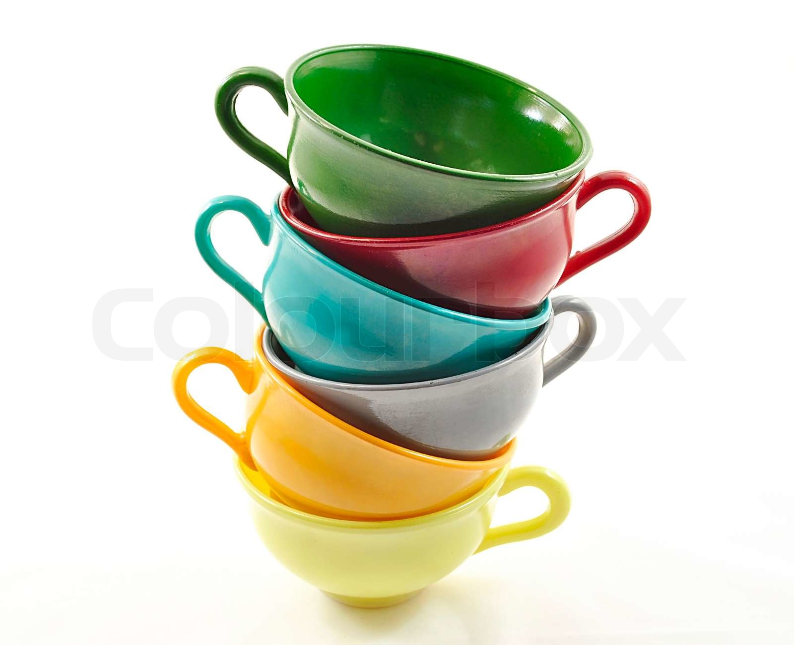 ein Stapel von bunten Kaffee oder Tee Tassen | Stock Bild | Colourbox