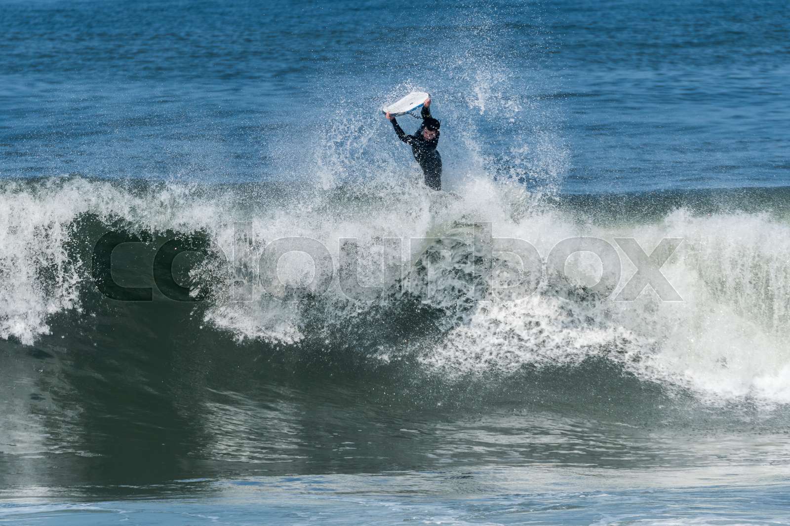 Bodyboarder in action | Stock image | Colourbox