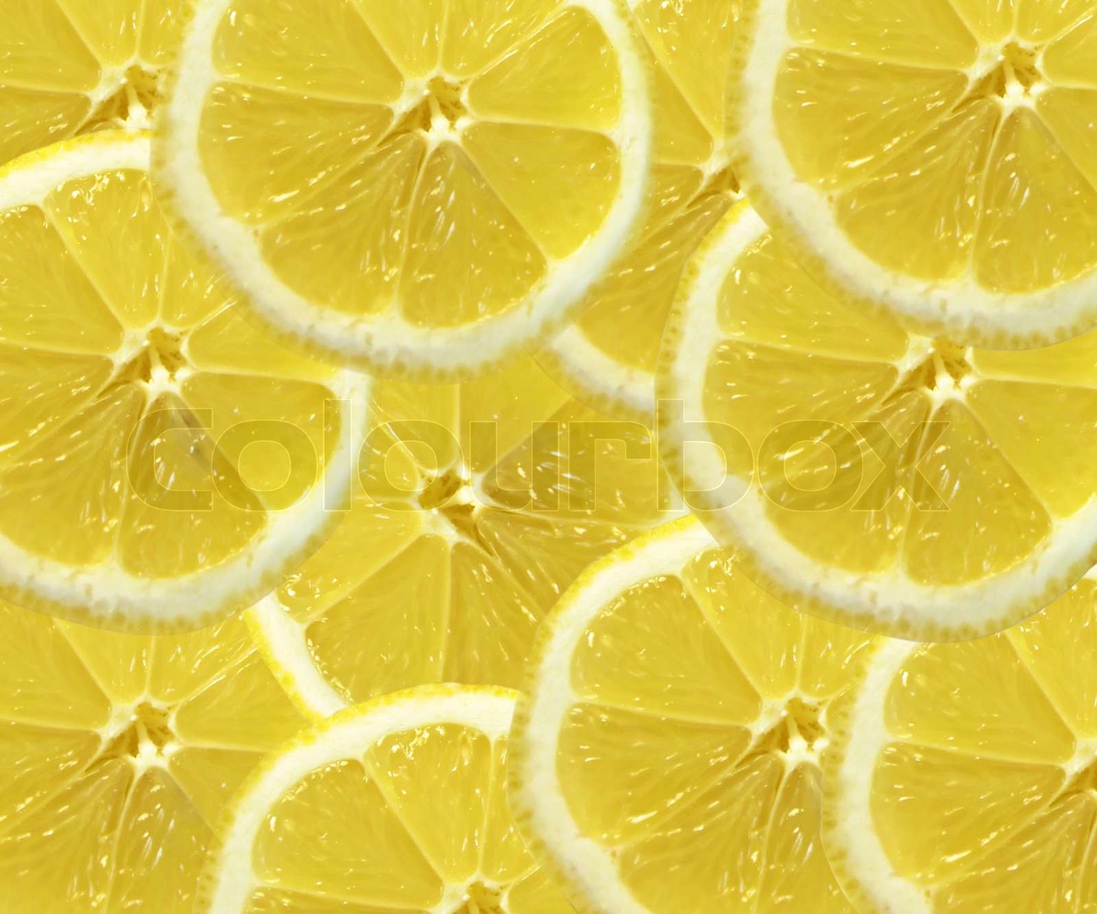 die sauren saftige gelbe Zitronen, runde Scheiben | Stock Bild | Colourbox