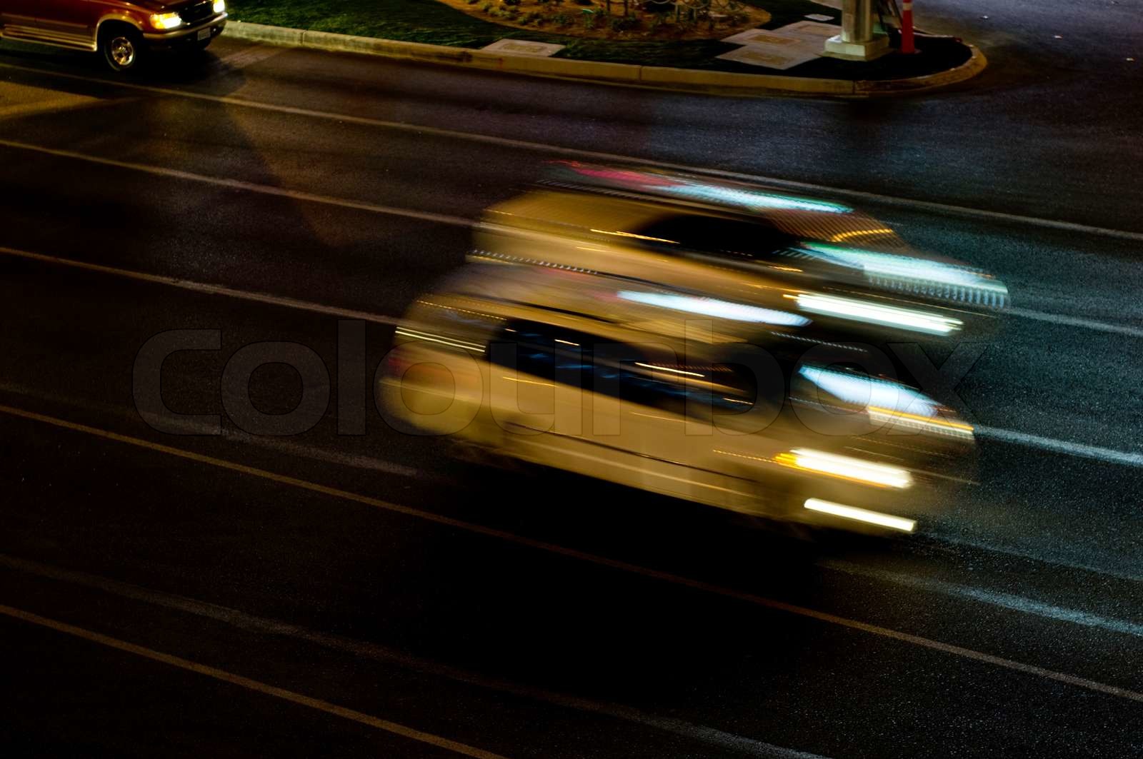 Moving traffic and car lights in the evening | Stock image | Colourbox