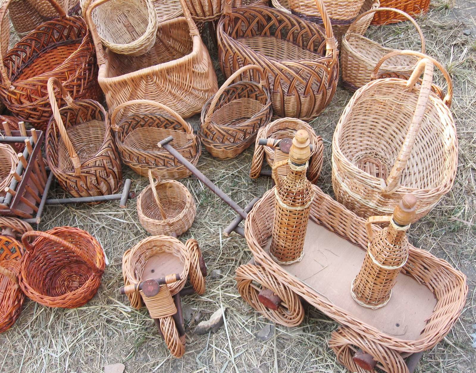 showcase wicker products: baskets, carts, bottles, handmade | Stock ...