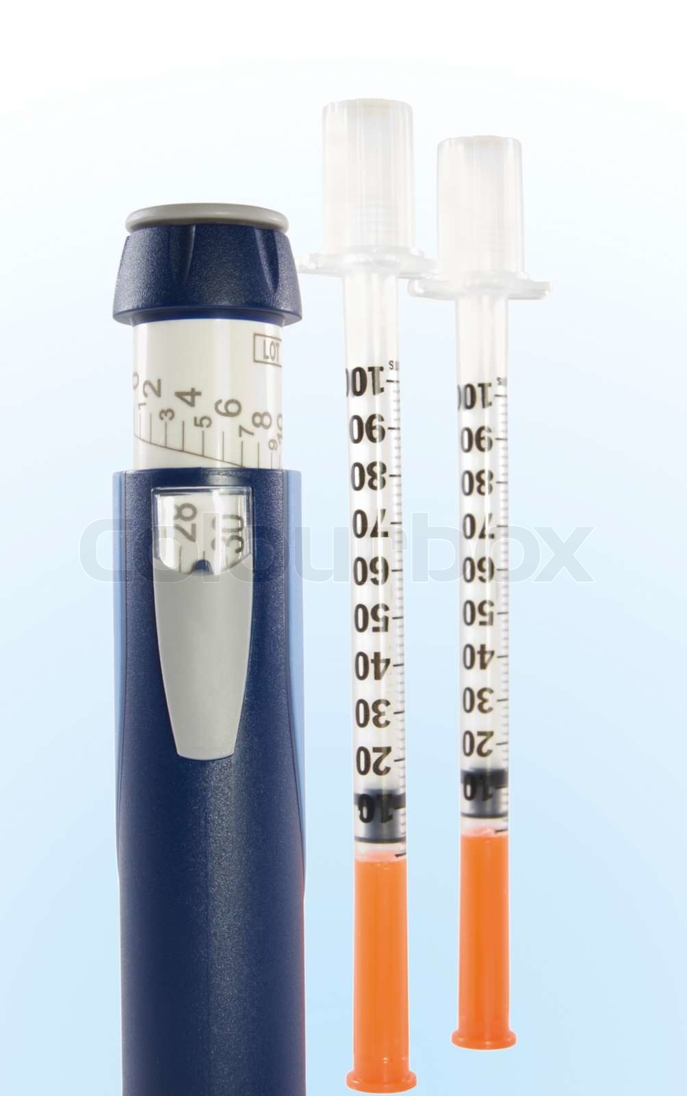 Insulin syringes and pen | Stock image | Colourbox
