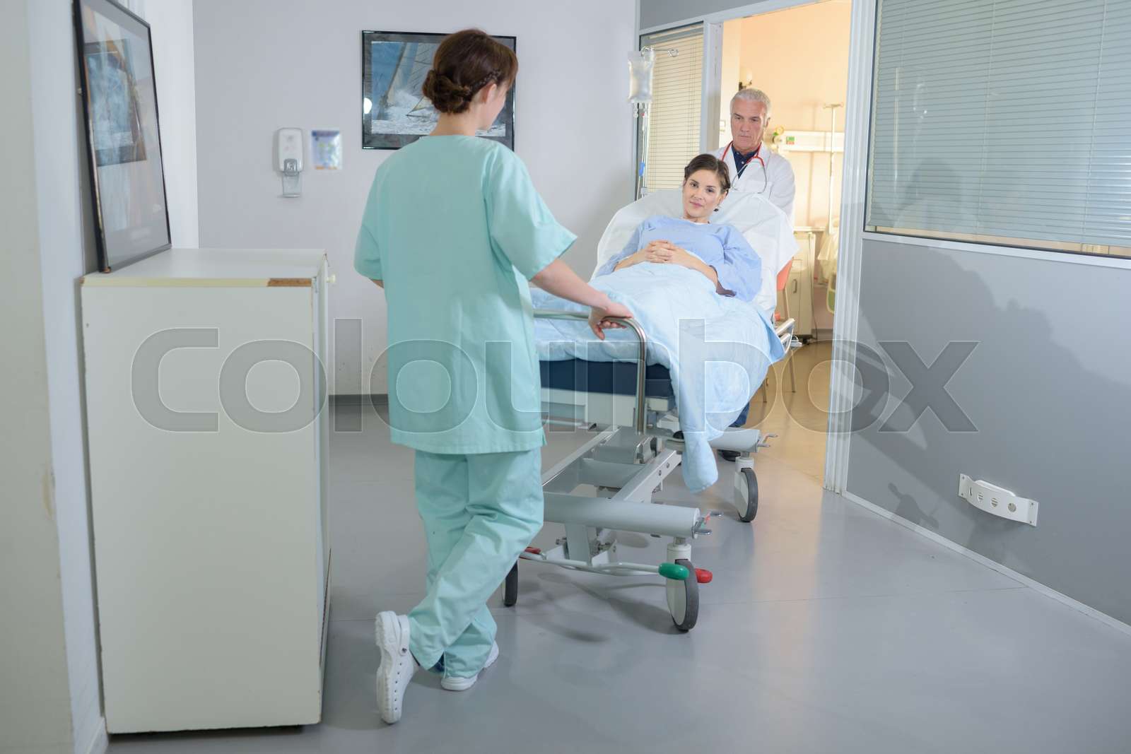 transferring the patient in the recovery room | Stock image | Colourbox
