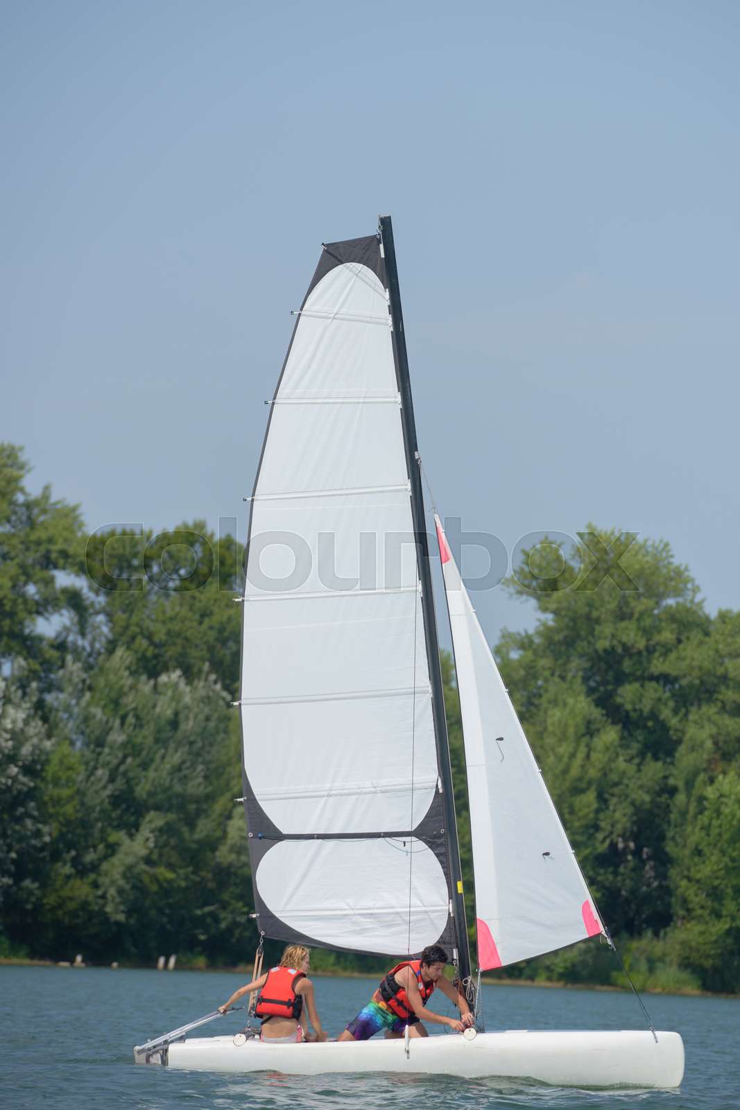 adjusting the sails | Stock image | Colourbox