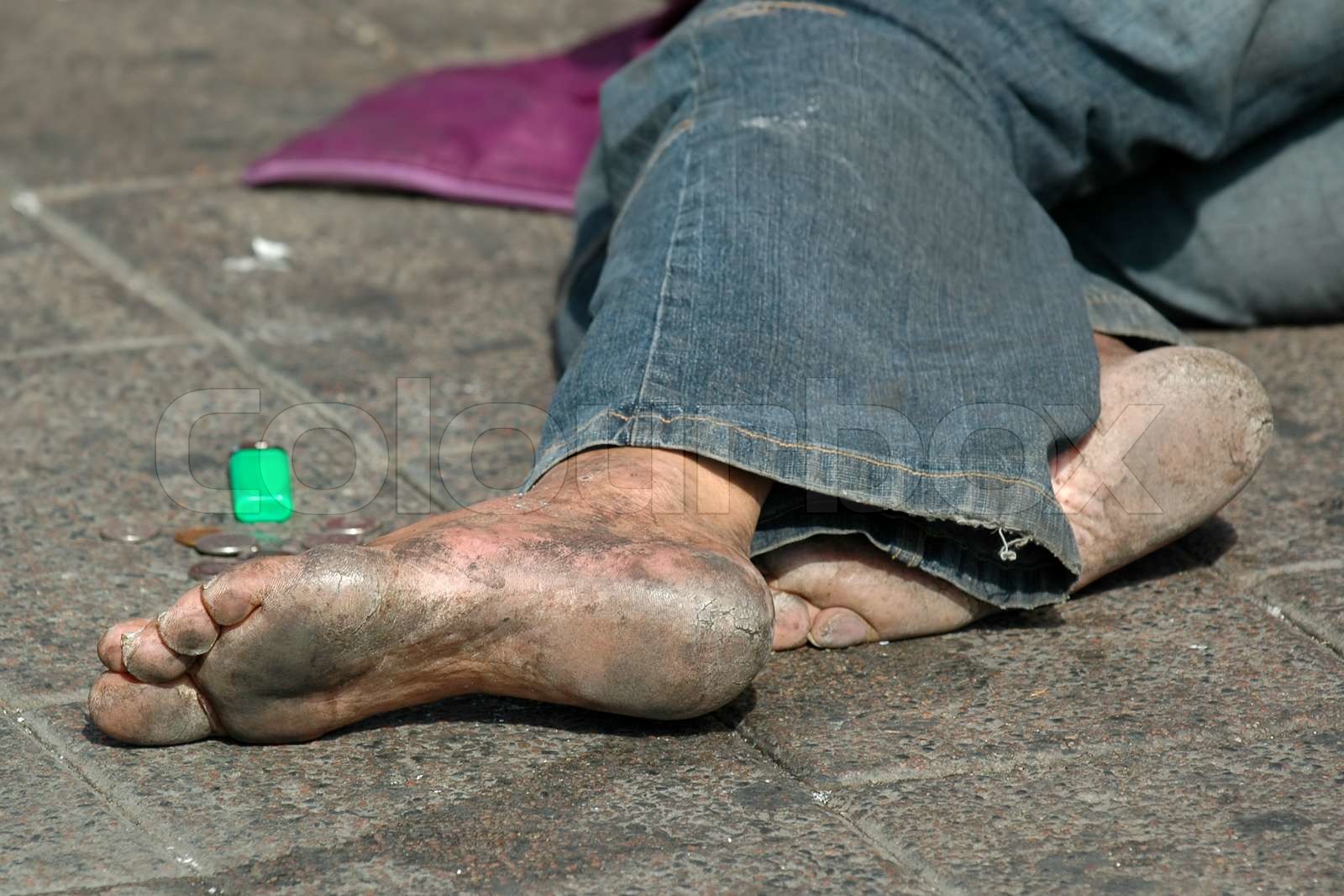 Homeless with bare feet | Stock image | Colourbox