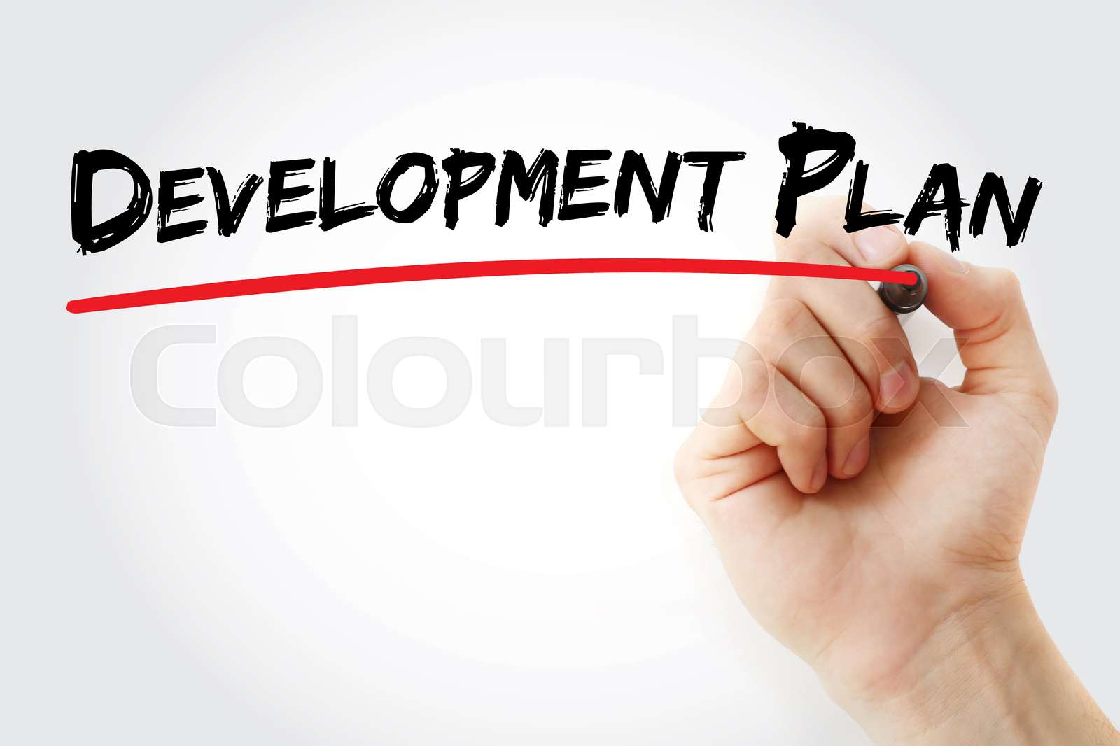 Hand writing Development plan with marker | Stock image | Colourbox