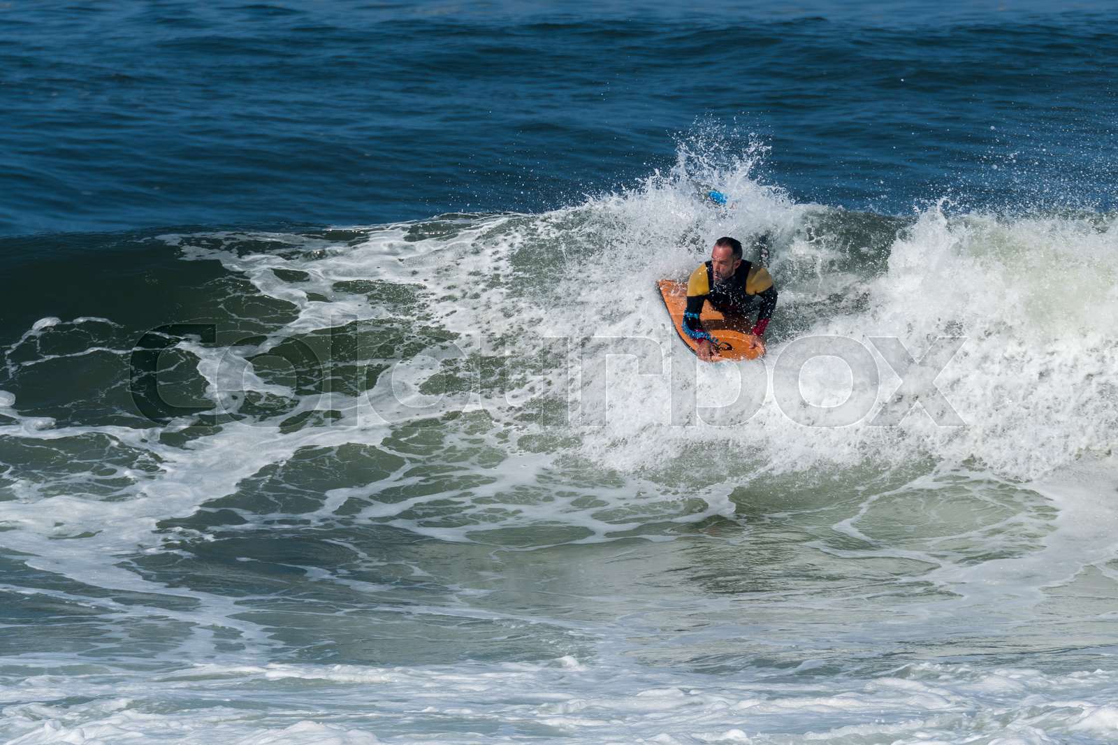 Bodyboarder in action | Stock image | Colourbox