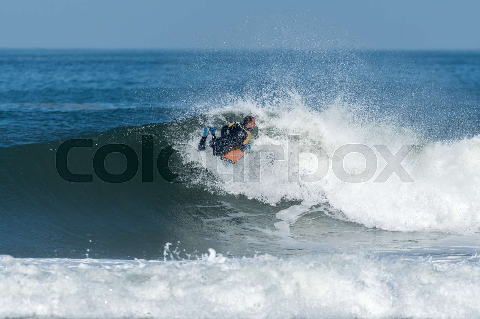 Bodyboarder in action | Stock image | Colourbox