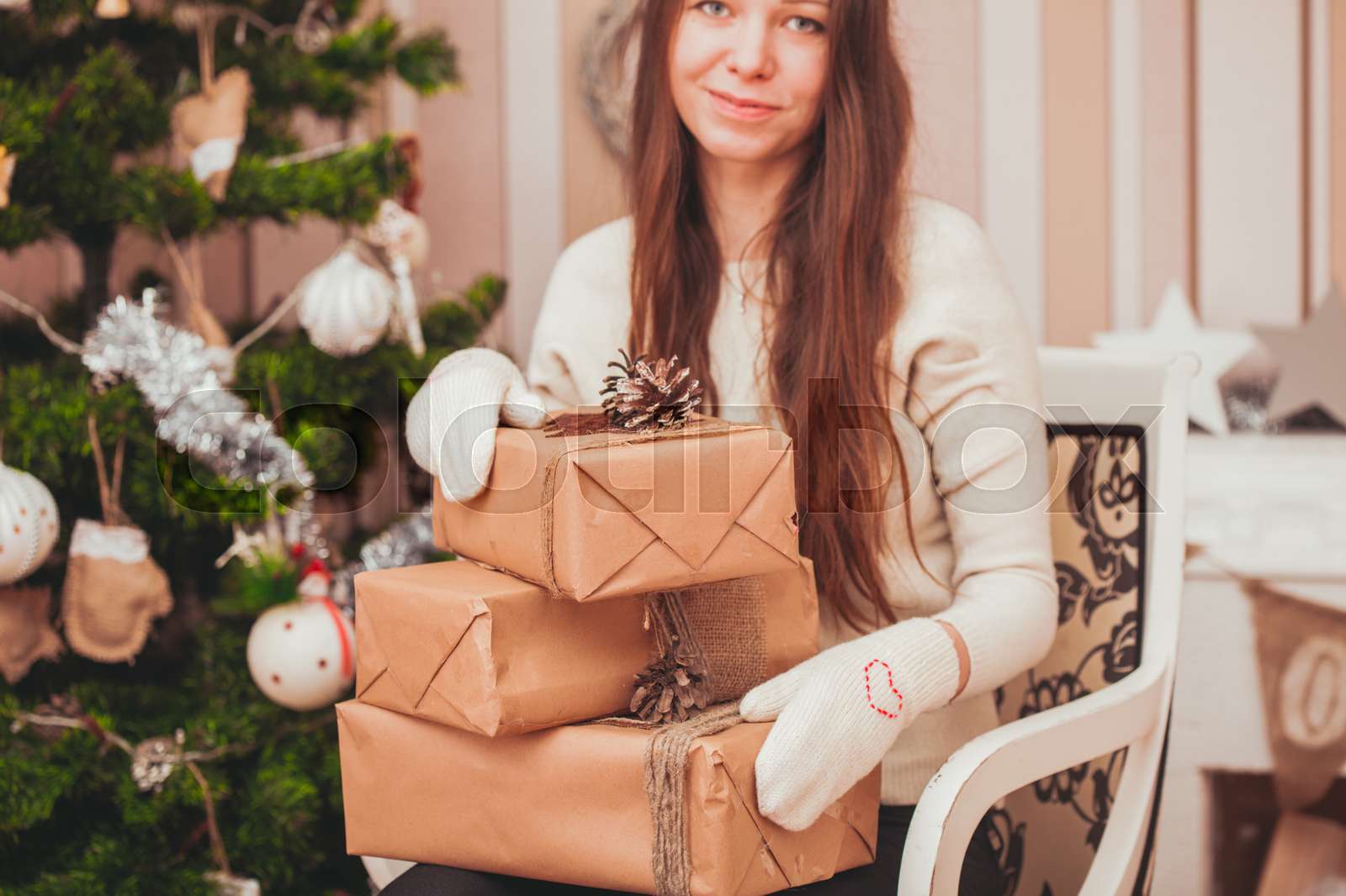 Girl with gift boxes | Stock image | Colourbox