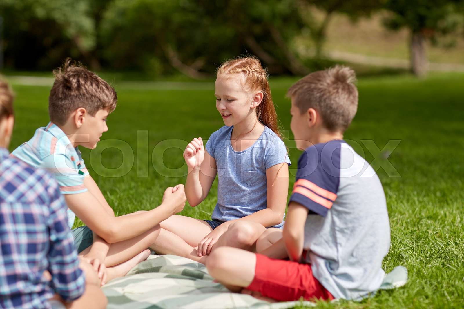happy kids playing rock-paper-scissors game | Stock image | Colourbox