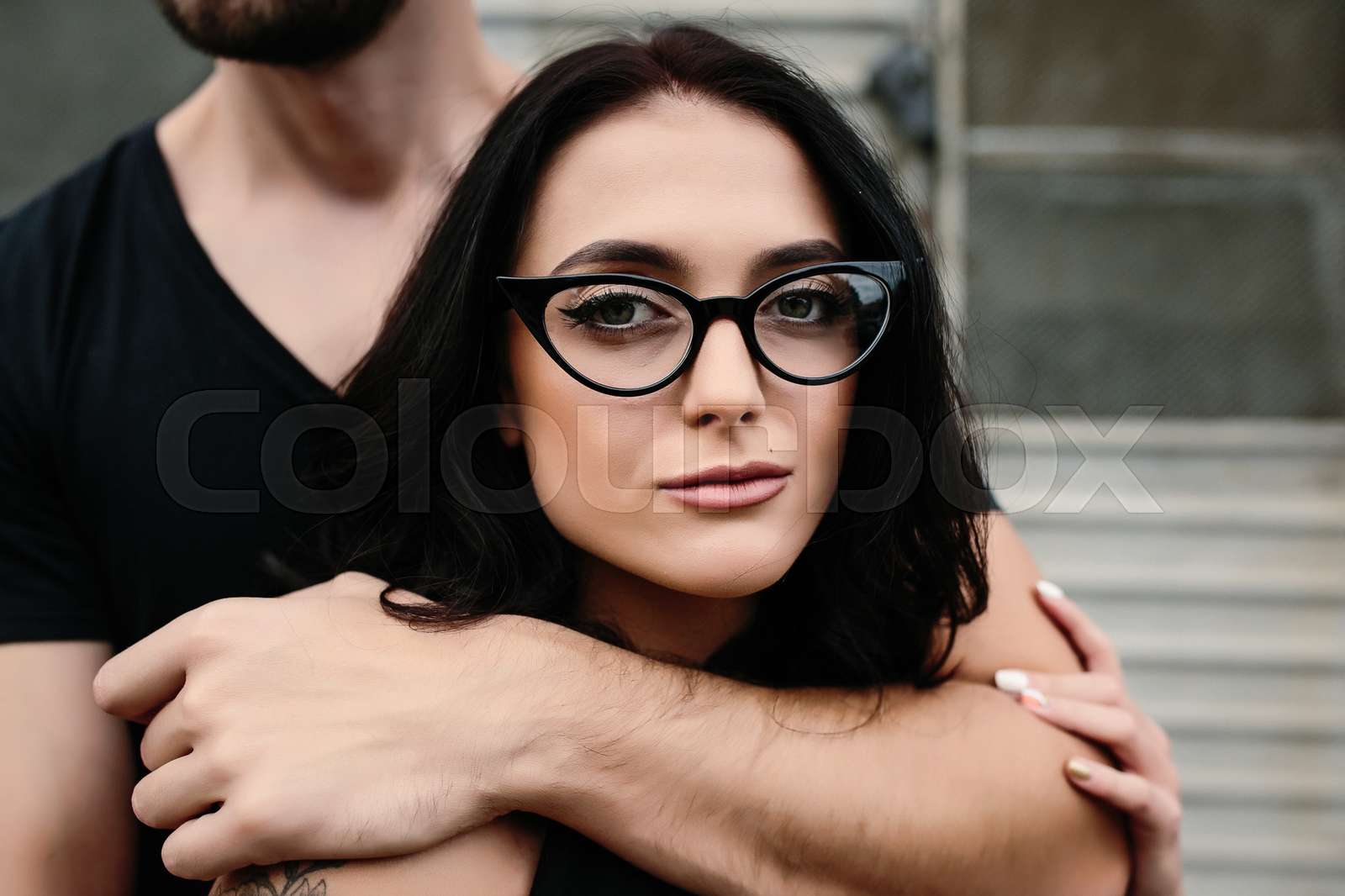 Guy Hugging His Girlfriend From Behind Stock Image Colourbox